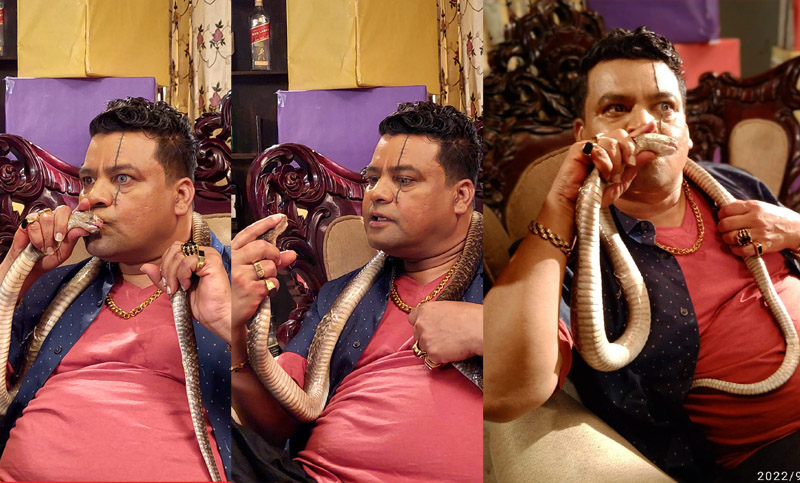 Dodul acts with live snake in Uttara